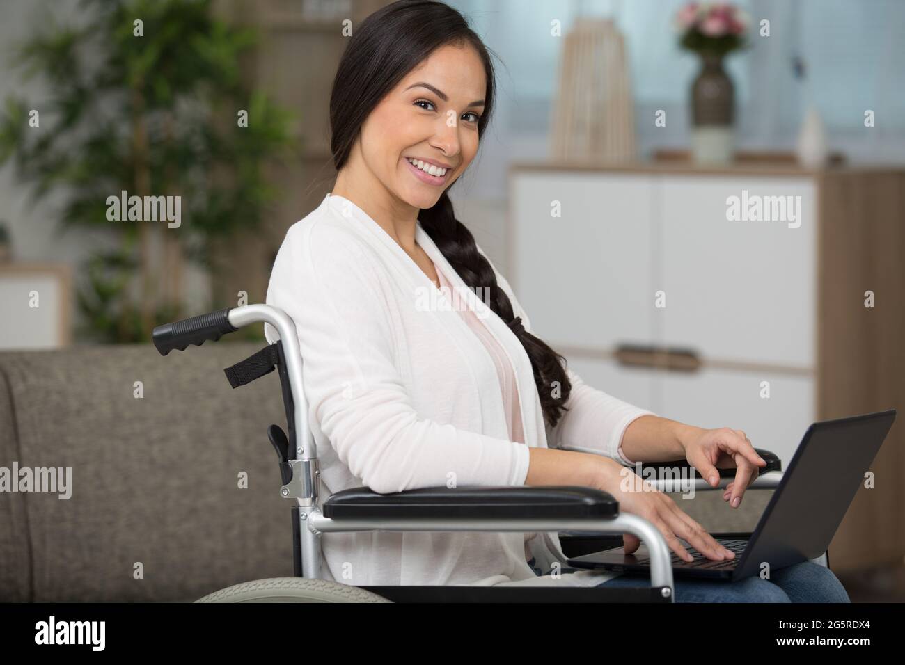 happy disable woman working from home Stock Photo - Alamy