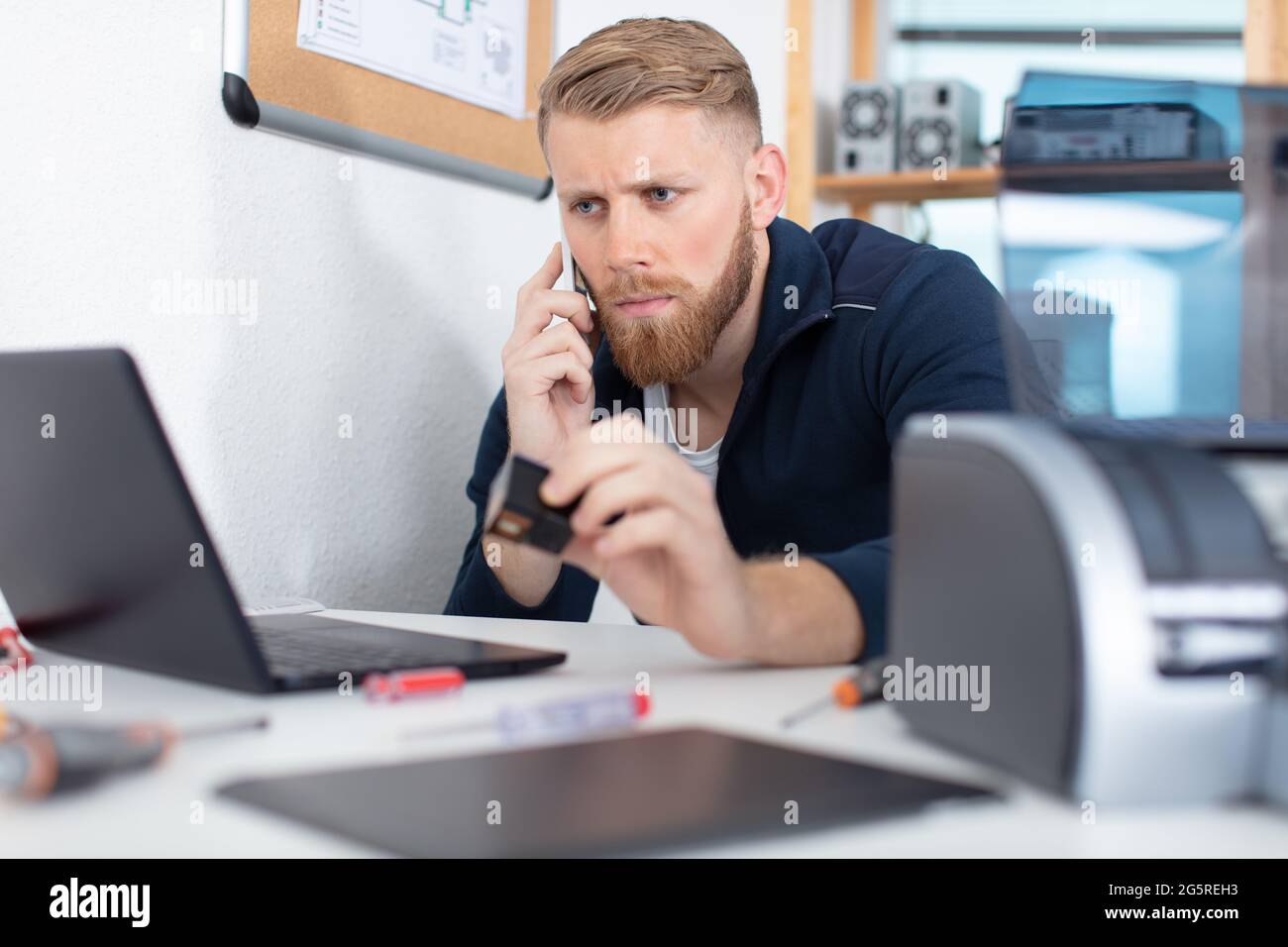 technician repairing inside of tablet Stock Photo - Alamy