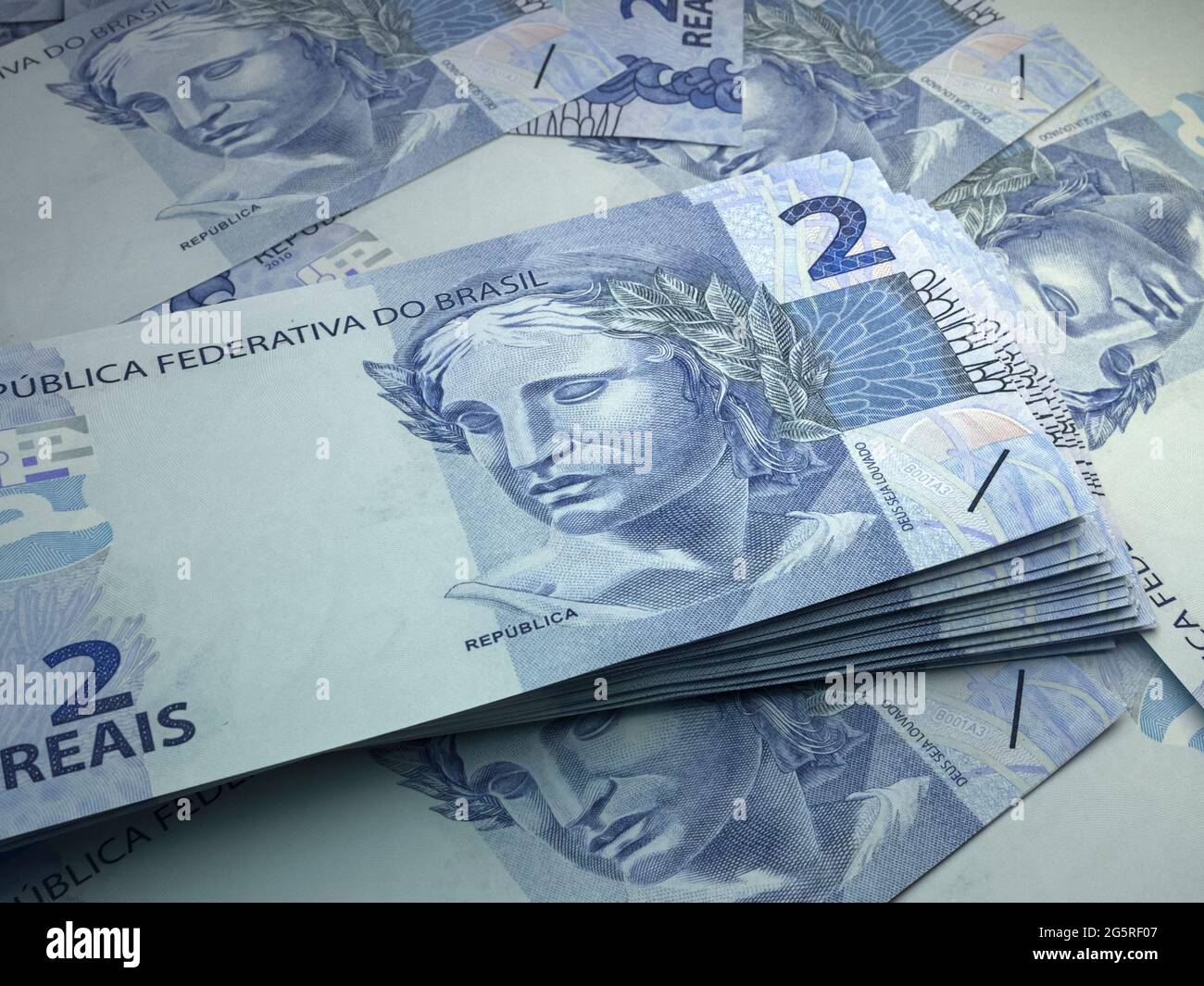 Money of Brazil. Brazilian real bills. BRL banknotes. 2 reals. Business ...