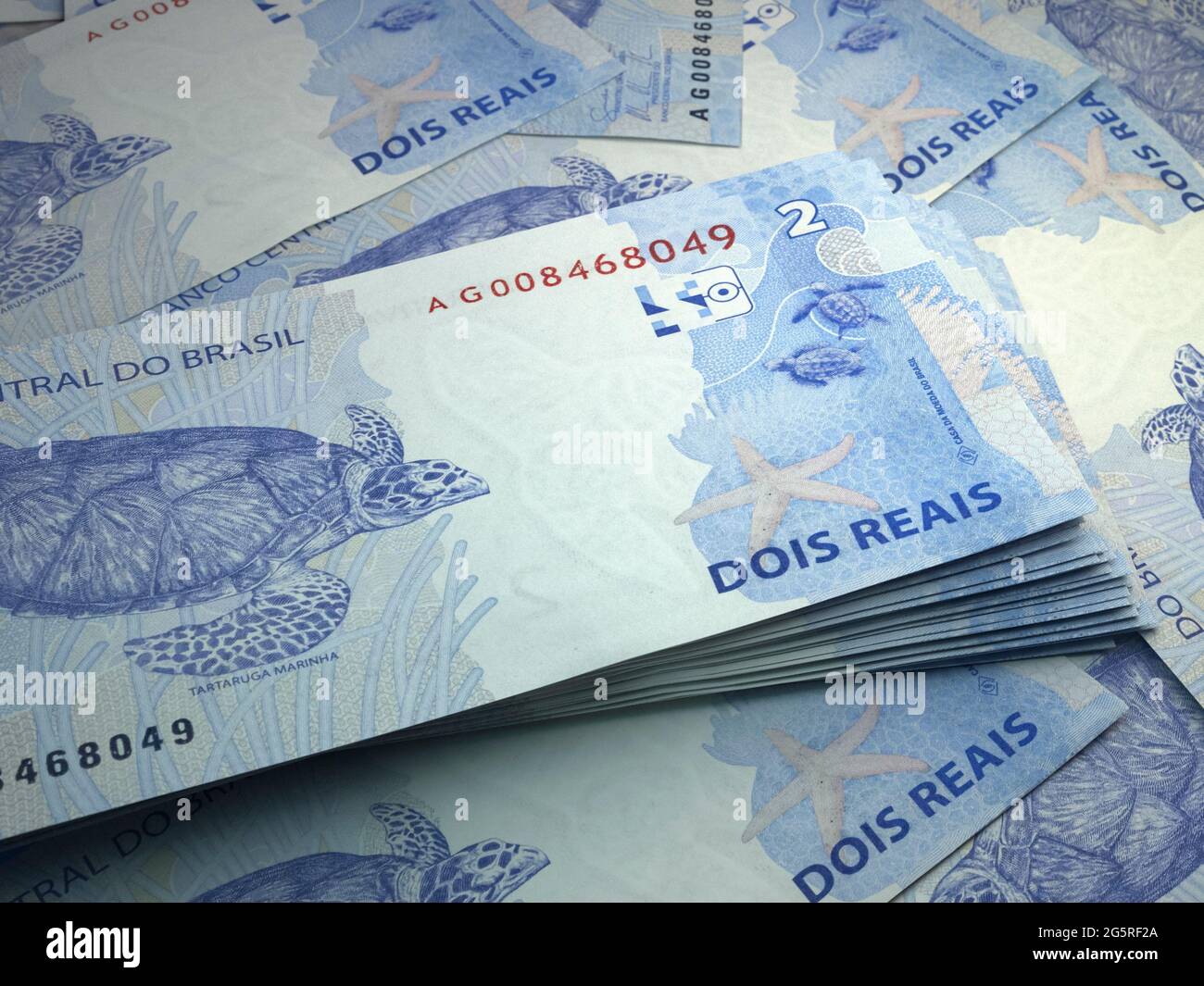 Money of Brazil. Brazilian real bills. BRL banknotes. 2 reals. Business ...