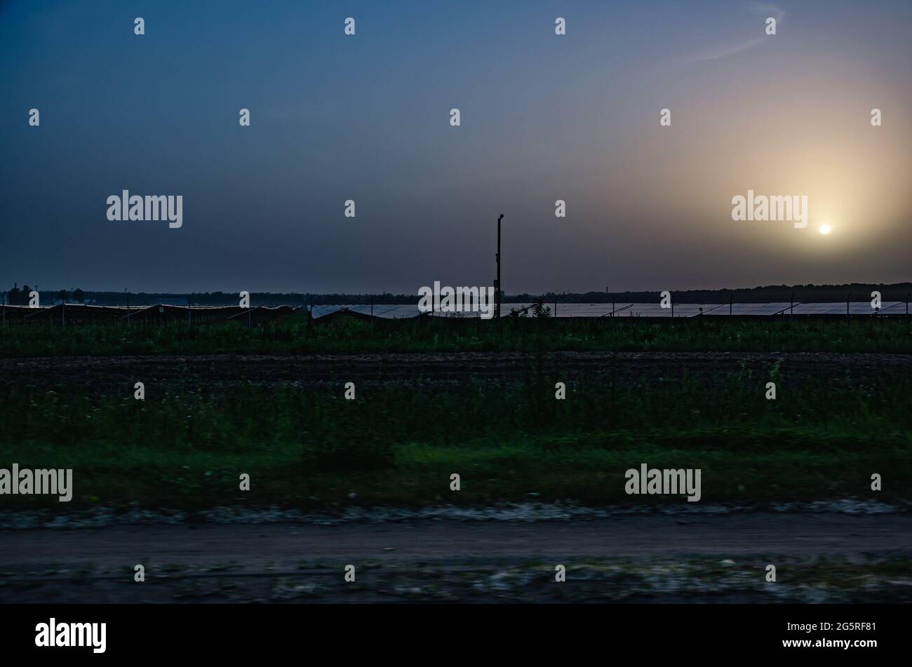 Solar photovoltaic panels at night Stock Photo - Alamy