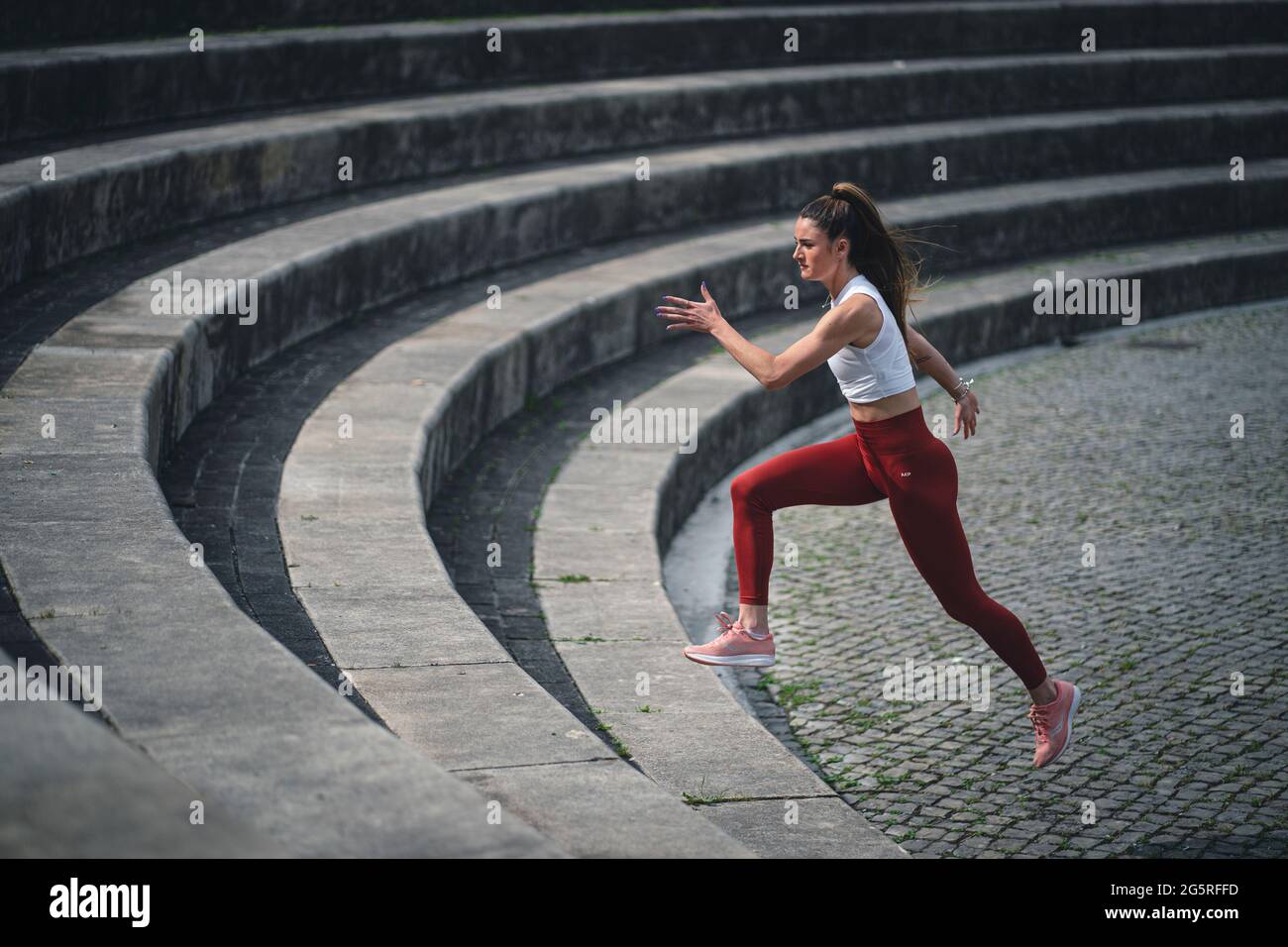 Athlete girl doing running up stairs, it is her lifestyle Stock Photo ...