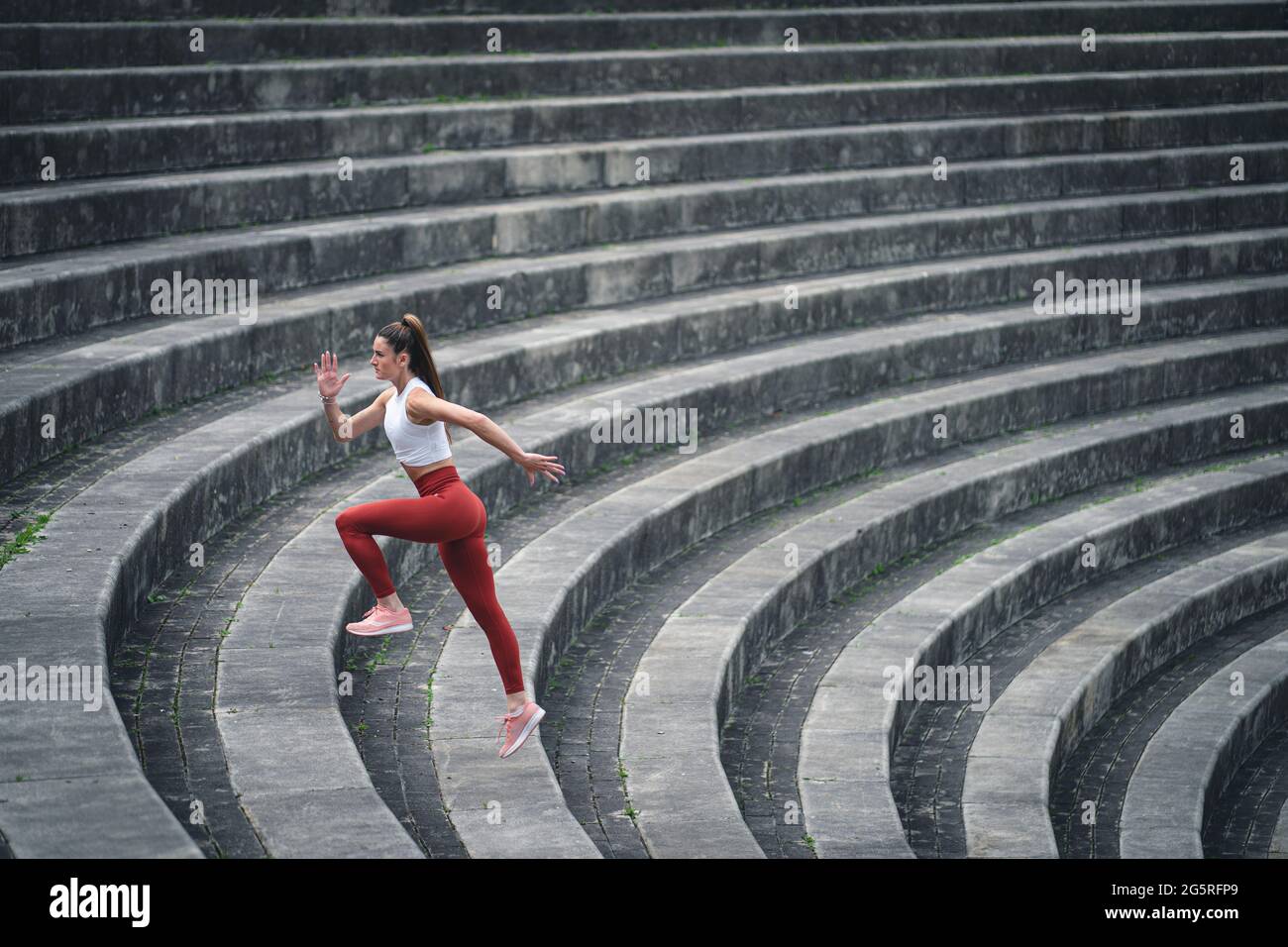 Athlete girl doing running up stairs, it is her lifestyle Stock Photo ...