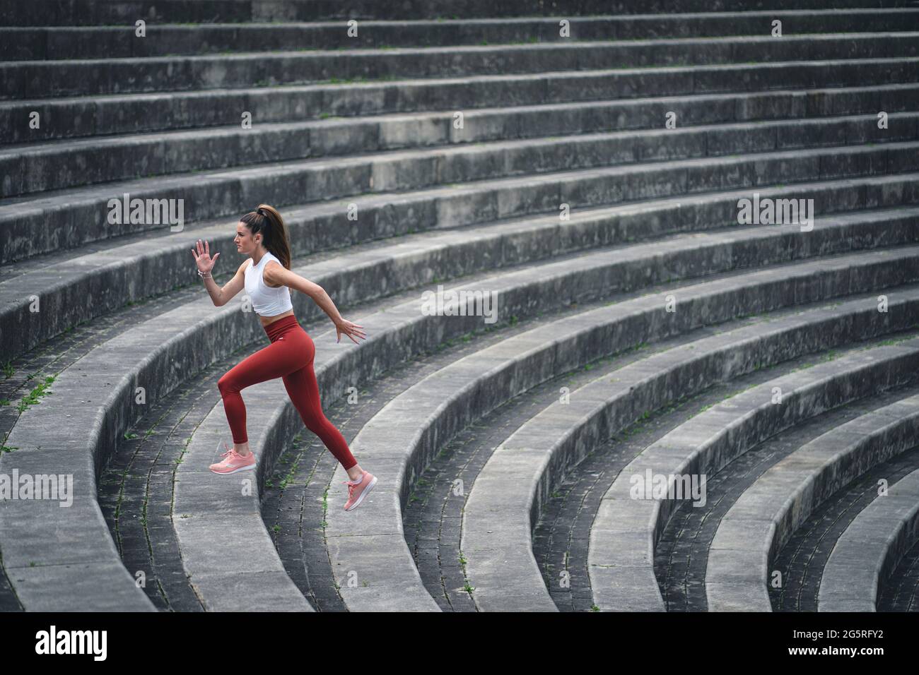 Athlete girl doing running up stairs, it is her lifestyle Stock Photo ...