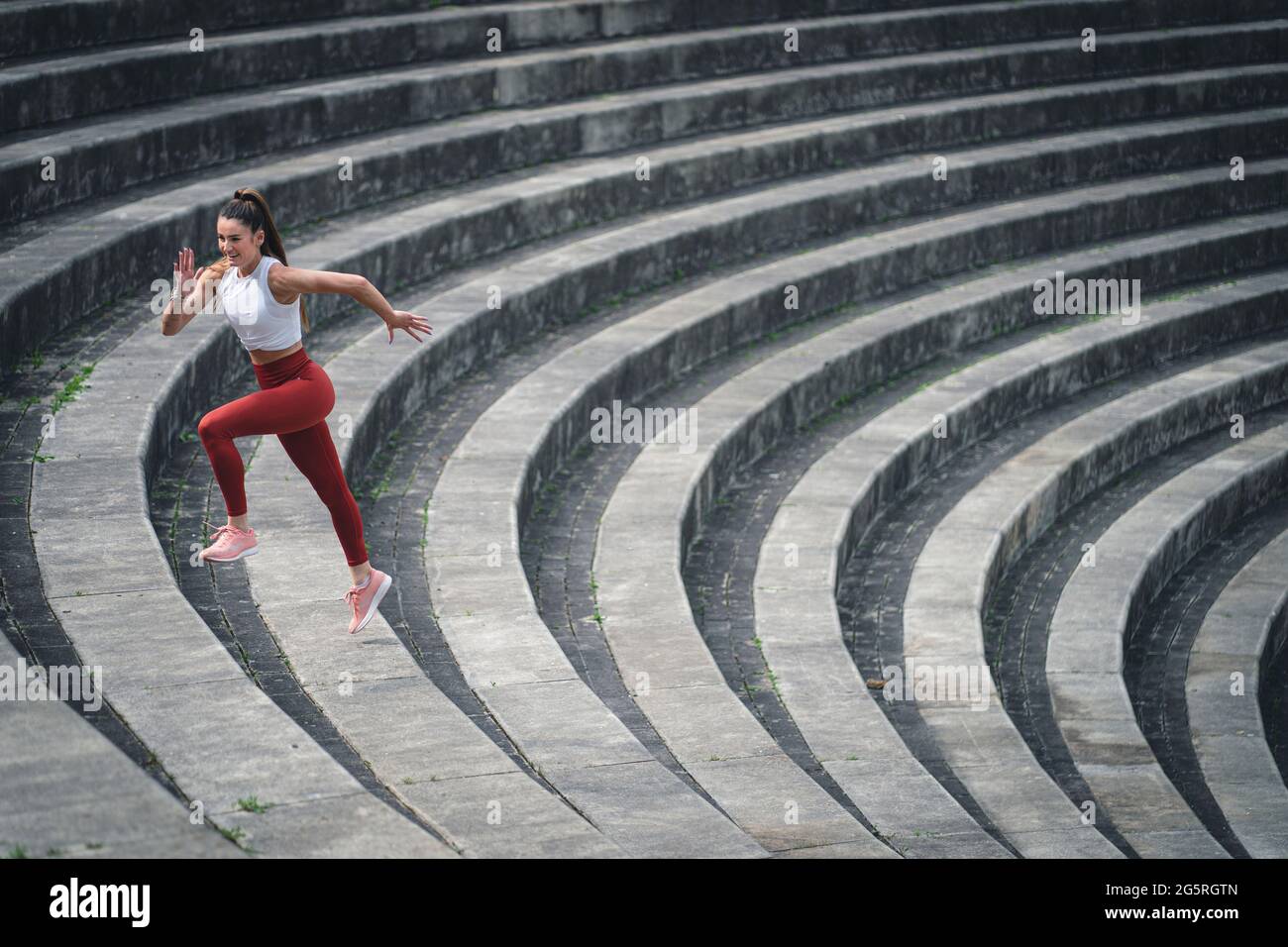 Athlete girl doing running up stairs, it is her lifestyle Stock Photo ...