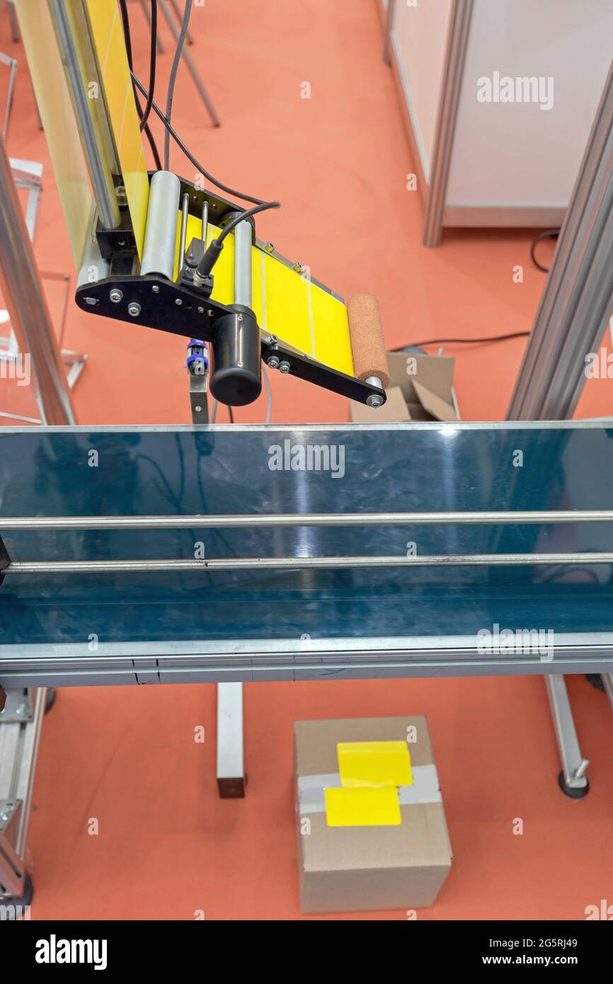 Automated Labeler Machine at Packing Line Conveyor Factory Stock Photo ...