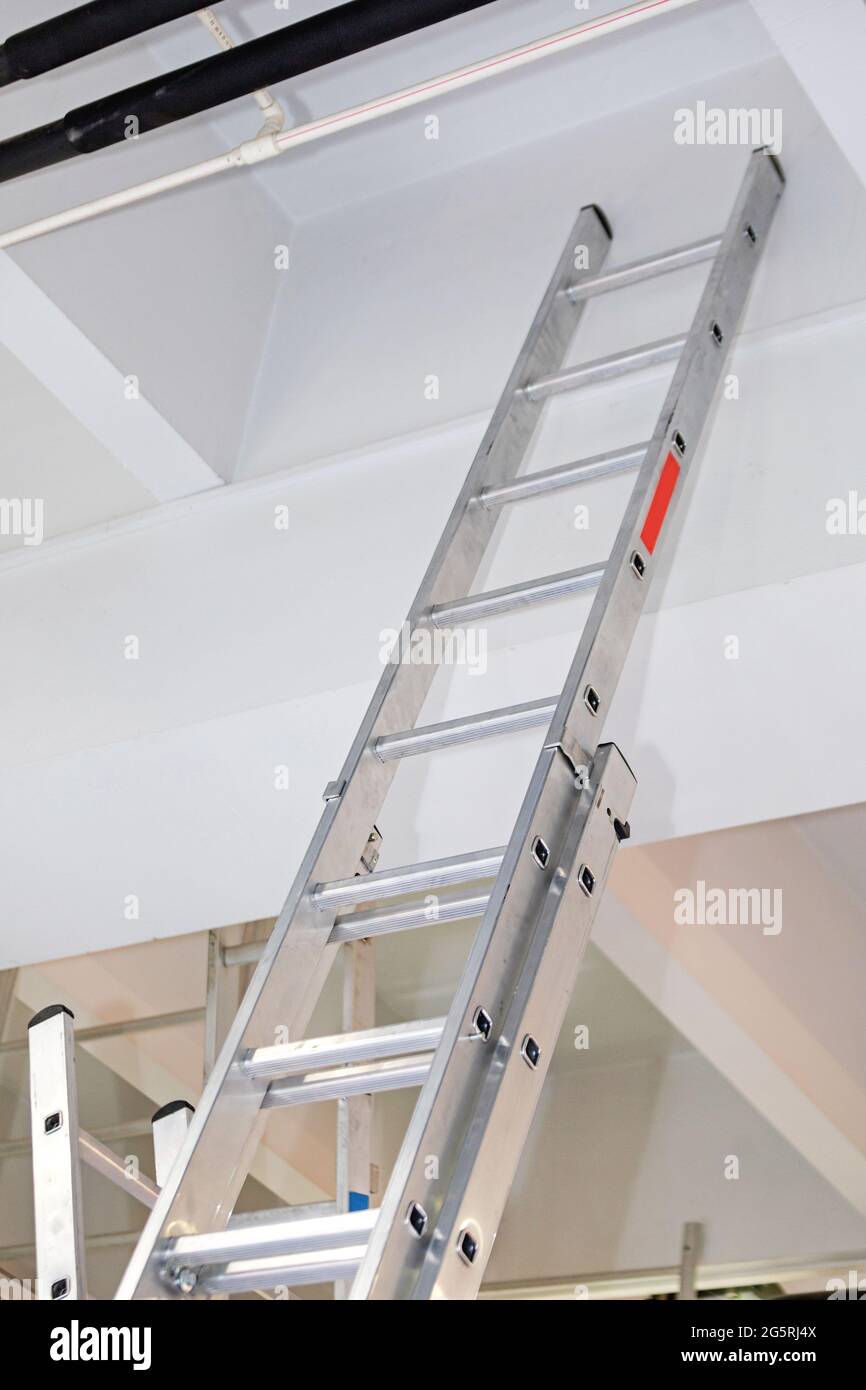 Aluminium Metal Tall Ladder in Building Stock Photo - Alamy