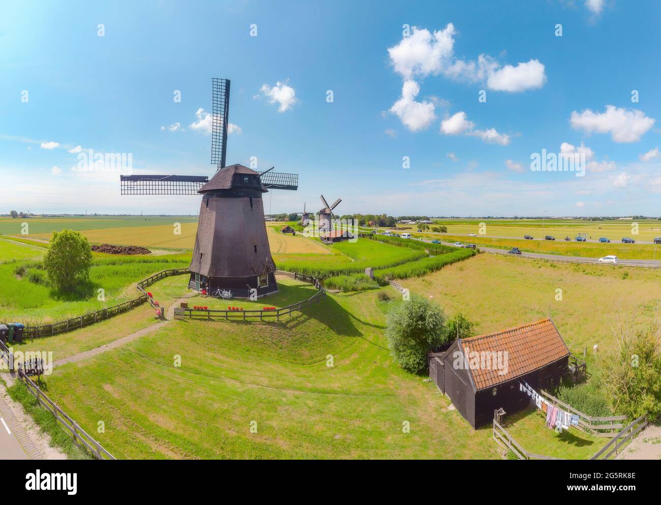 Three waterpumping windmill of the Schermer polder Stock Photo - Alamy