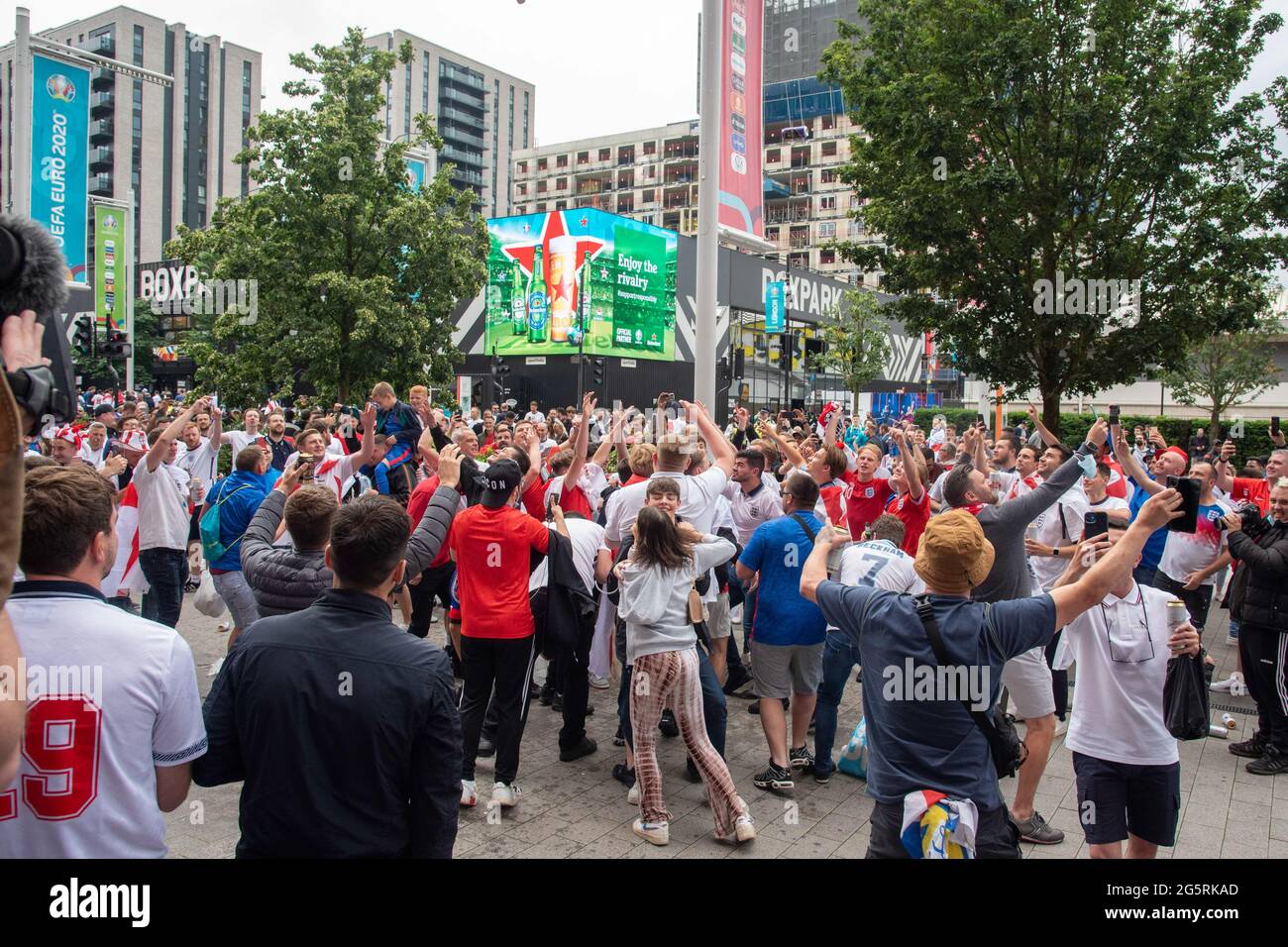 London, UK. 29th June, 2021. England fans gather singing and shouting ...