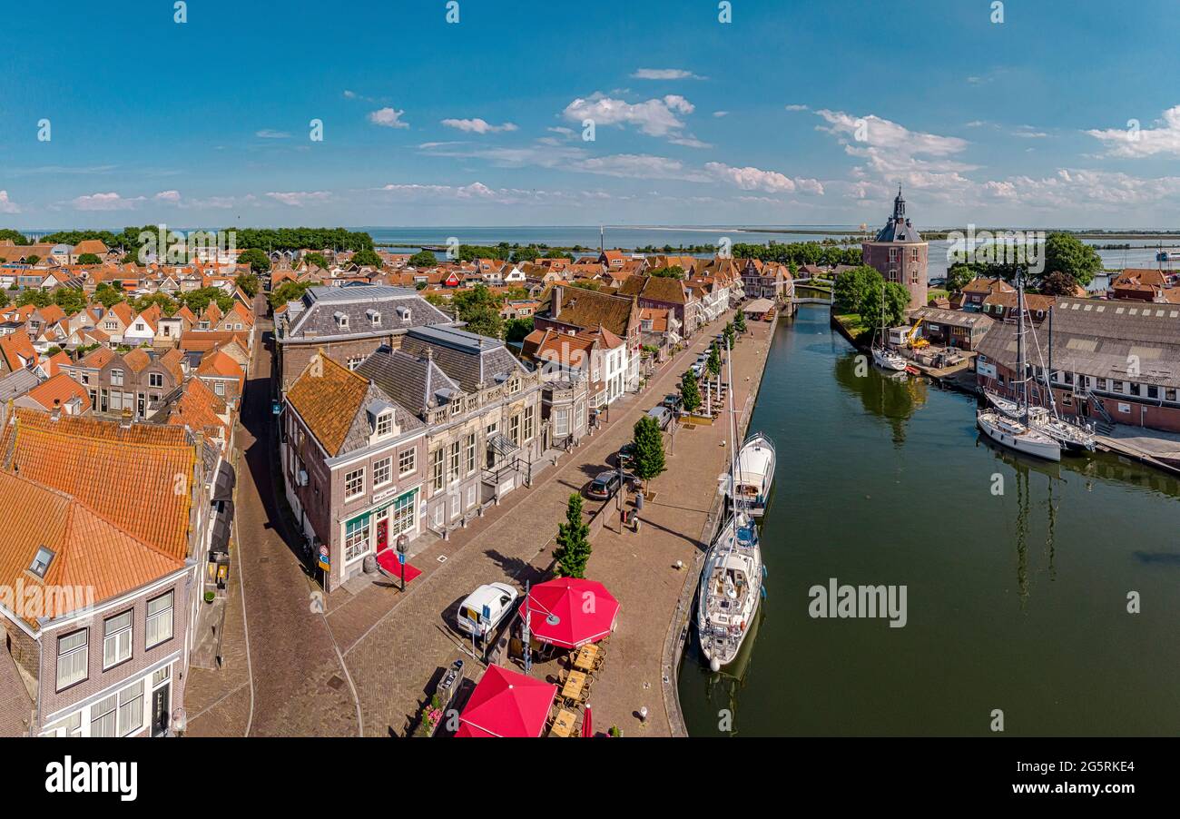 The Old Port with the town gate called Drommedaris Stock Photo - Alamy