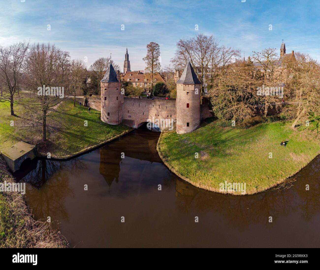 Watergate called Monnikendam and the belltower of Our Lady Stock Photo ...