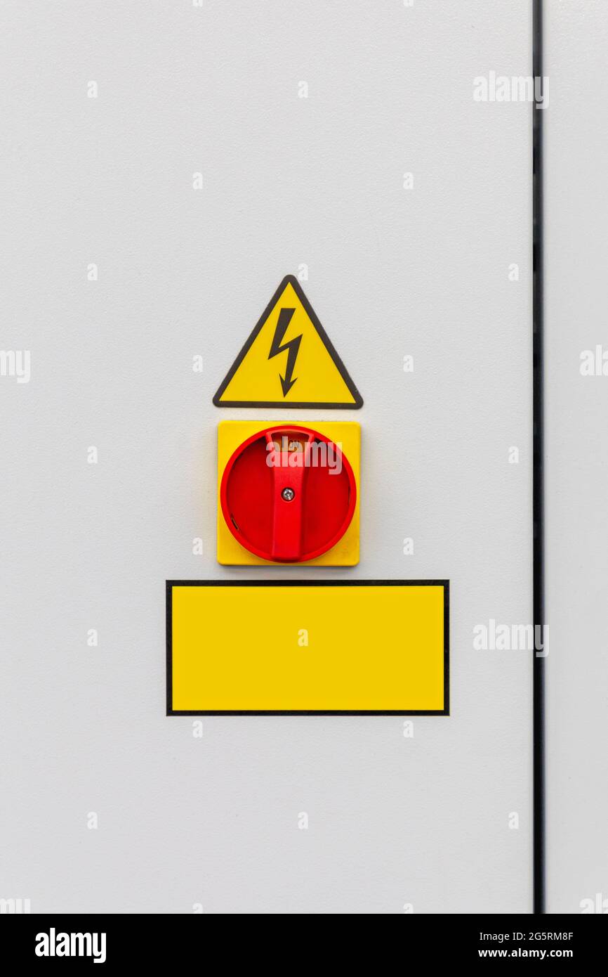 Warning Triangle Electric Power Main Switch at Machine Stock Photo - Alamy