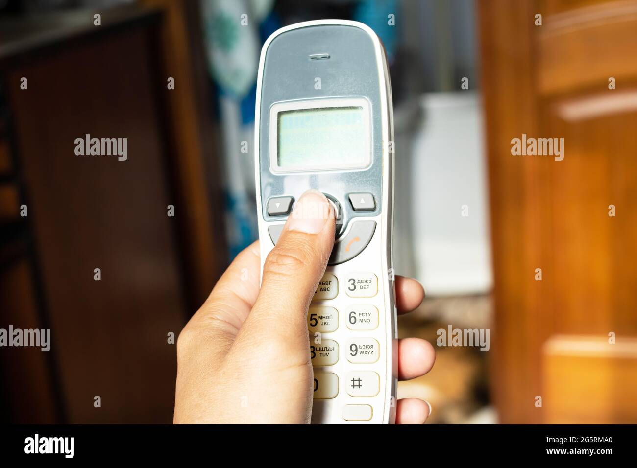 Landline telephone home man hi-res stock photography and images - Alamy