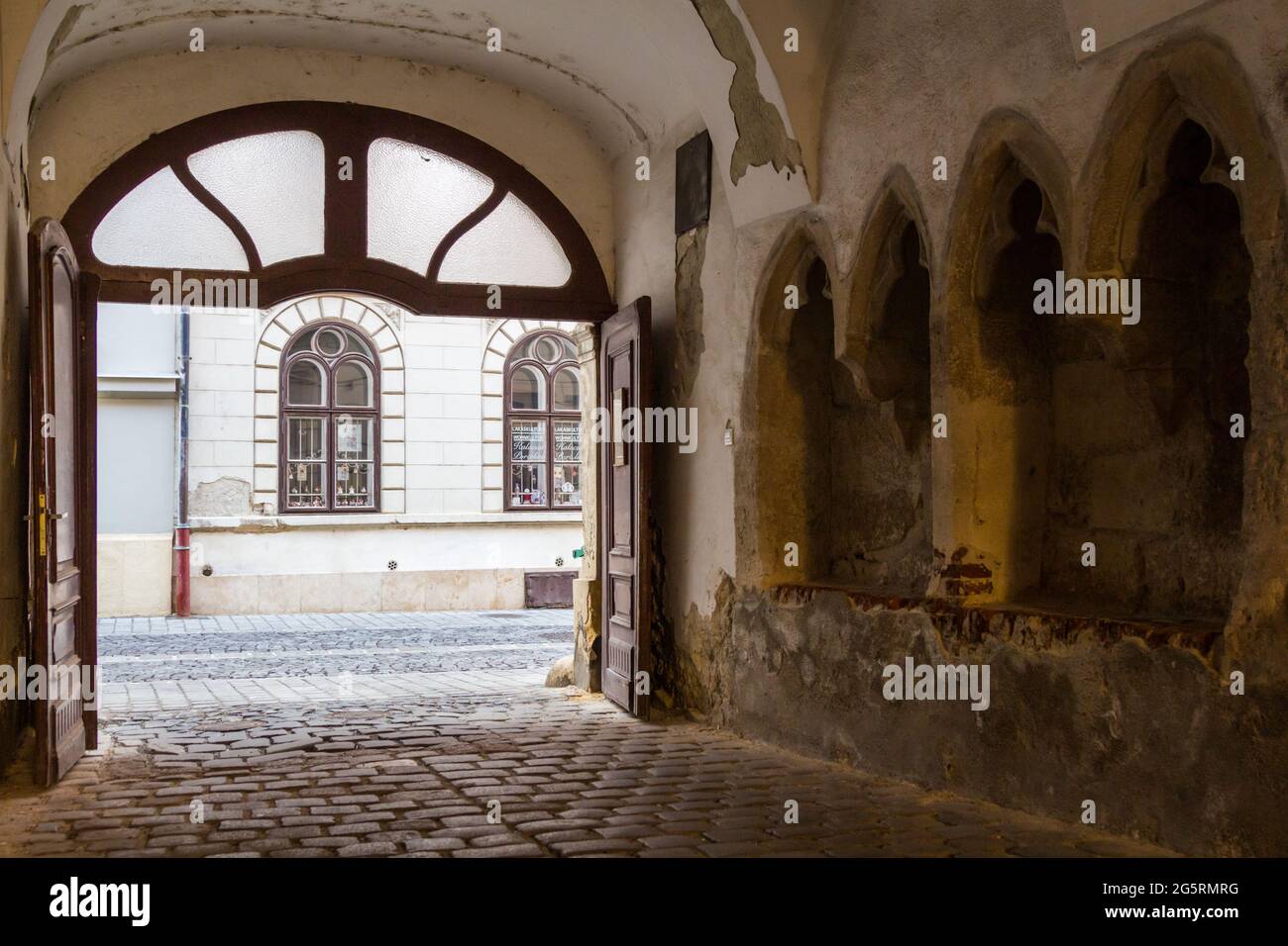 Gothic niches for sitting (ulofulke) in gateway of Evangelikus ...