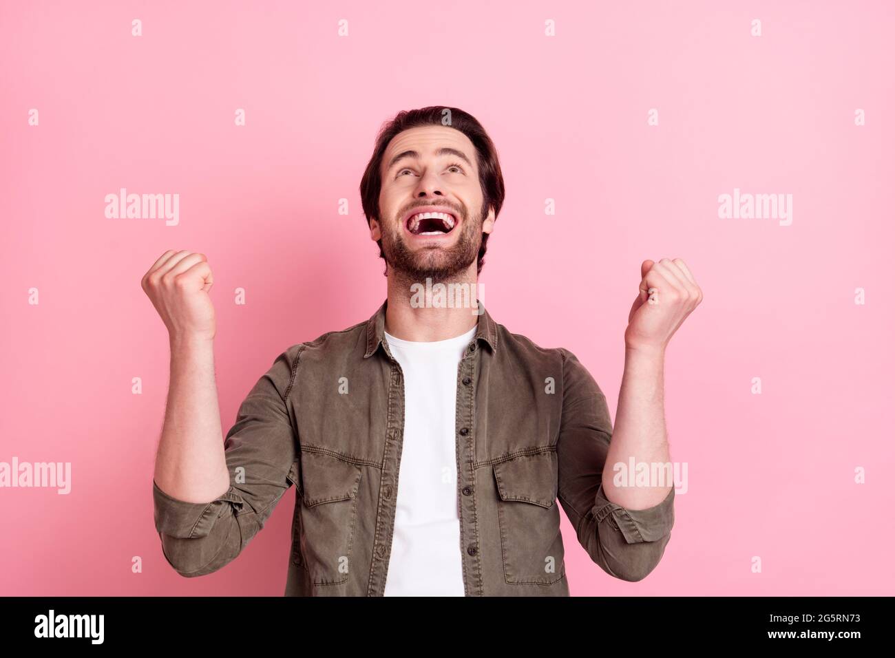 Photo of young excited man happy positive smile celebrate victory win ...