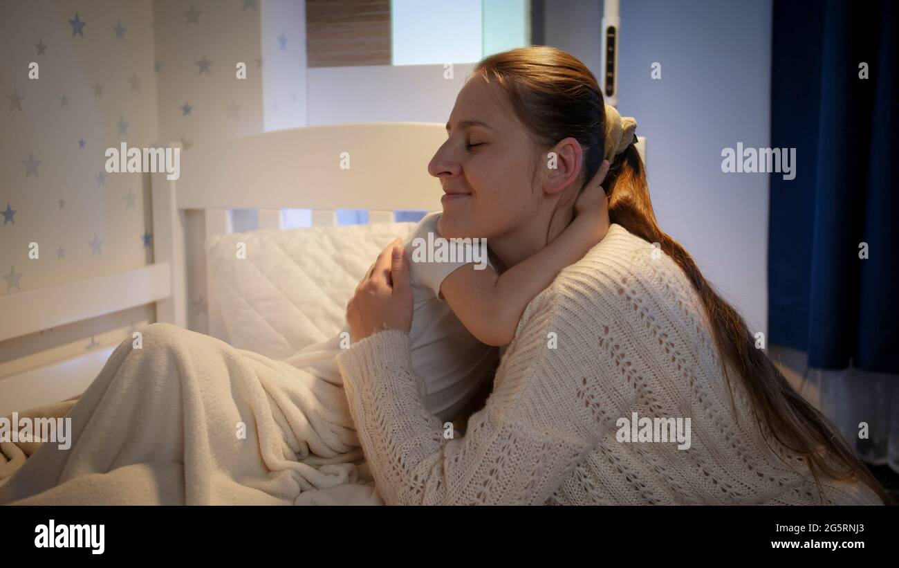 Sick mother hugging children hi-res stock photography and images - Alamy