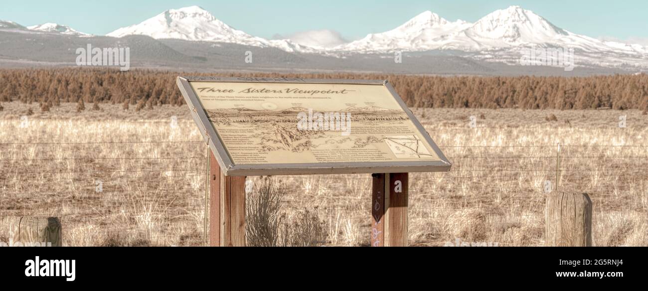 Viewpoint sign with information about The Three Sisters Mountains Stock ...