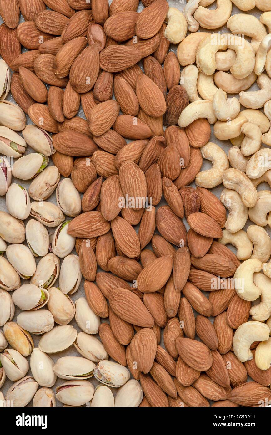 Nuts background, top view. The natural background is made from ...