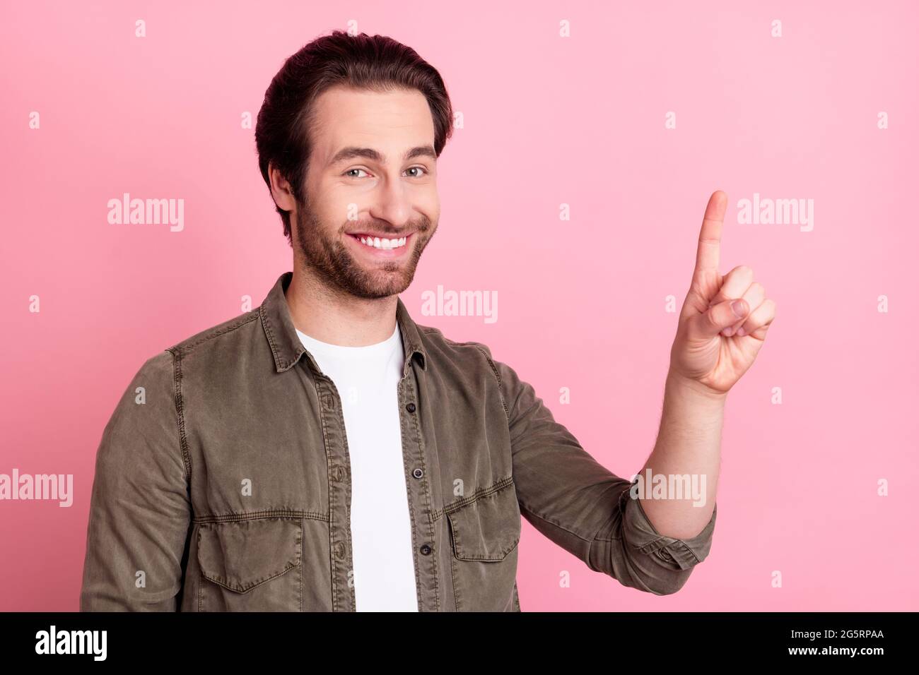 Photo of young man happy positive smile point finger have idea pefect ...