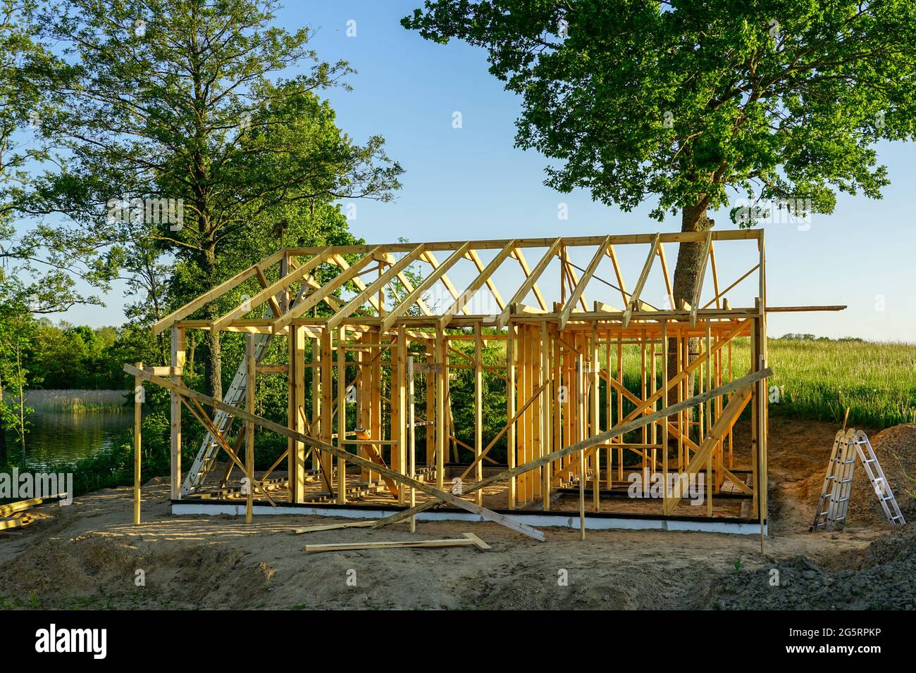 construction of a simple wooden recreation building on the lake shore ...