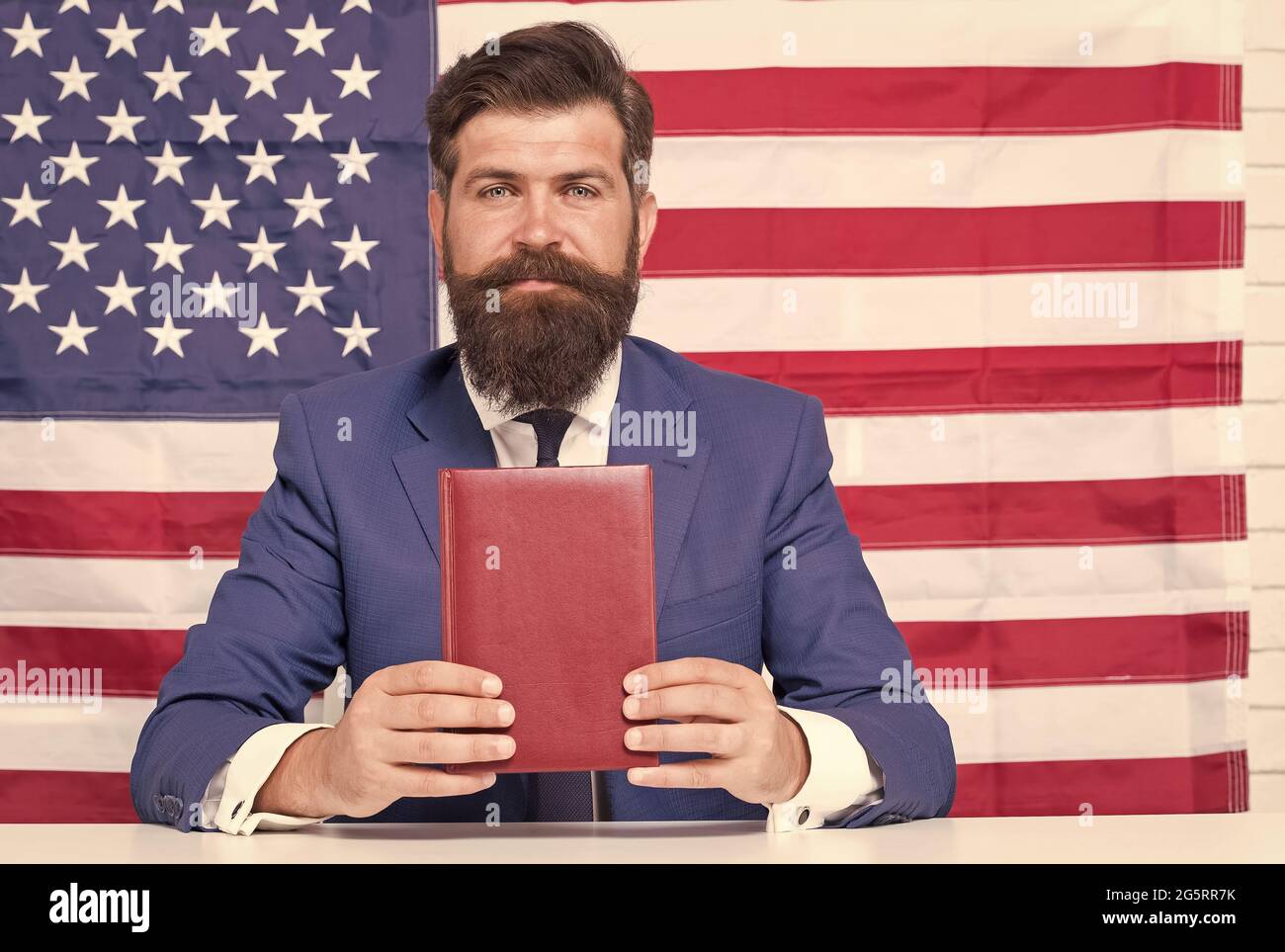 American writer bearded man presenting book, modern literature concept ...