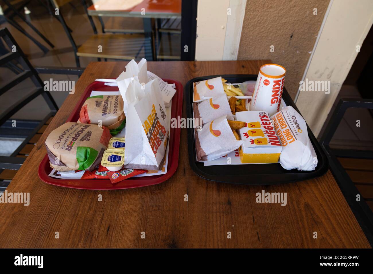 Segovia, Spain - June 2, 2021: A couple of fast food trays, with ...