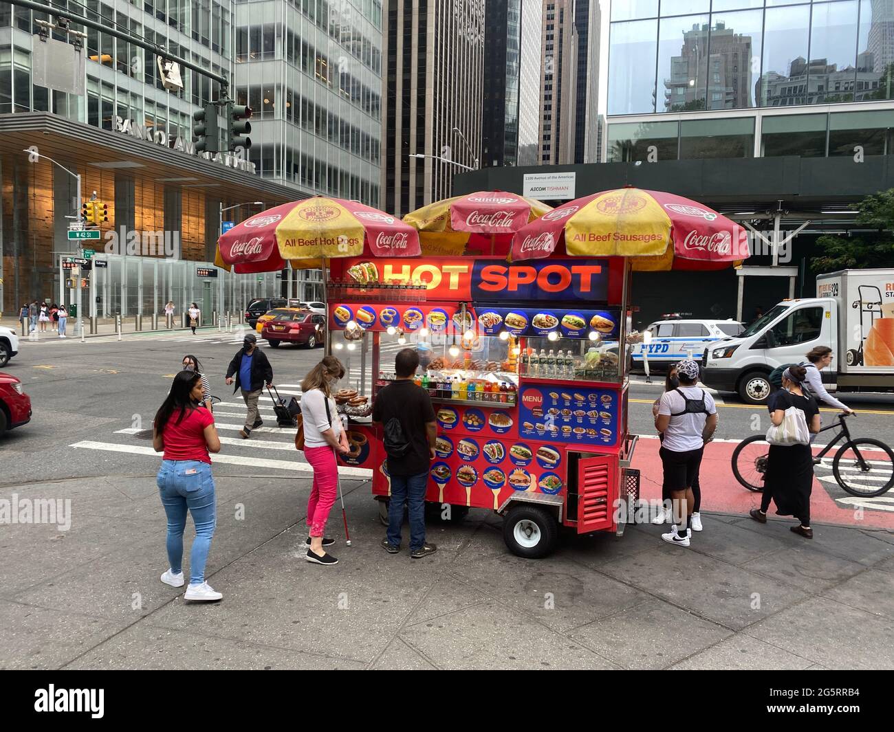 Hot dog vendor has a prime spot at the corner of 6th Avenue and 42nd ...