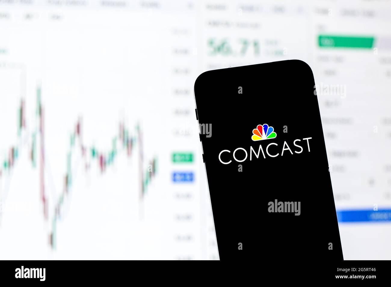 Spain. 29th June, 2021. In this photo illustration a Comcast ...