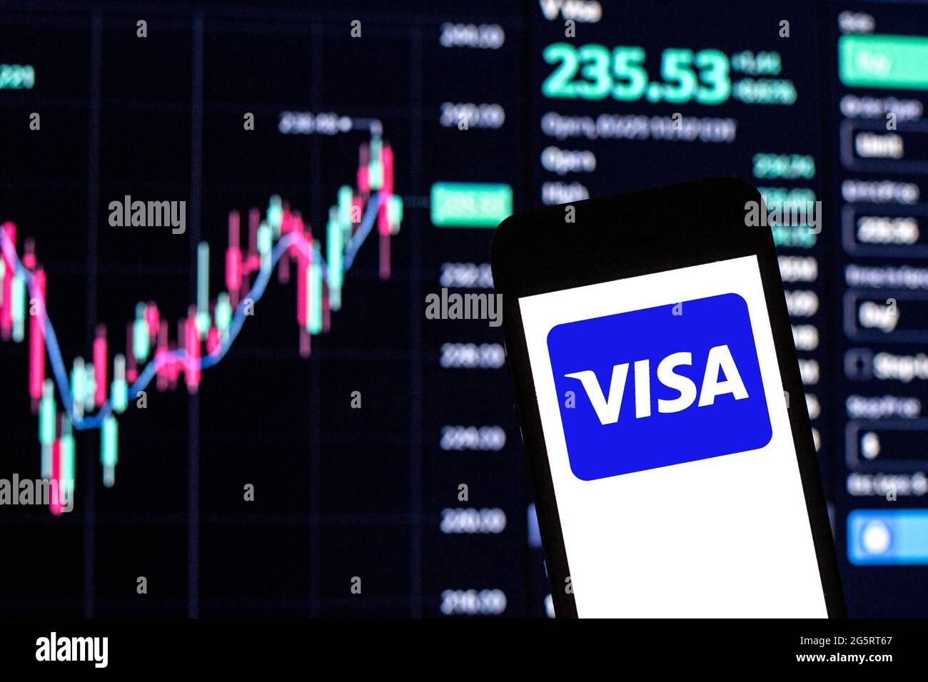 In this photo illustration a Visa Inc. logo seen displayed on a ...