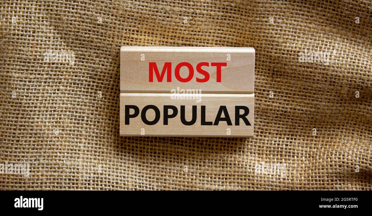 Most popular symbol. Concept words Most popular on wooden blocks on a ...