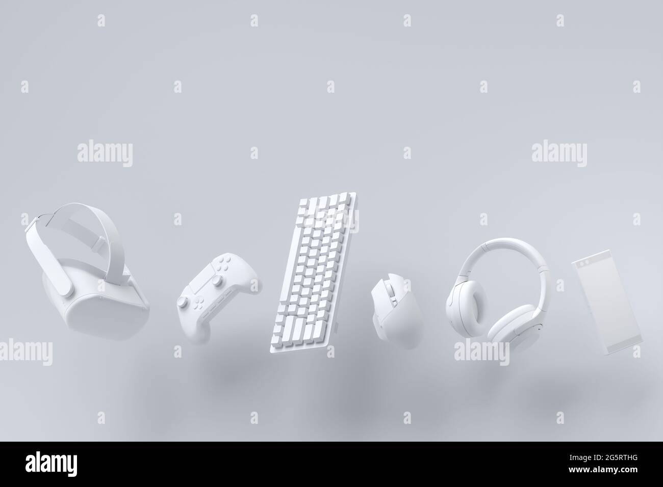 Flying gamer gears like mouse, keyboard, joystick, headset, VR on white ...