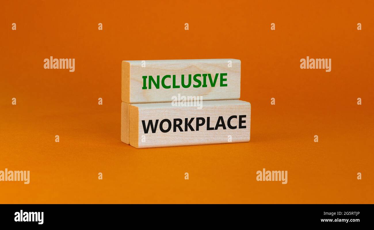 Inclusive workplace symbol. Wooden blocks with words Inclusive ...