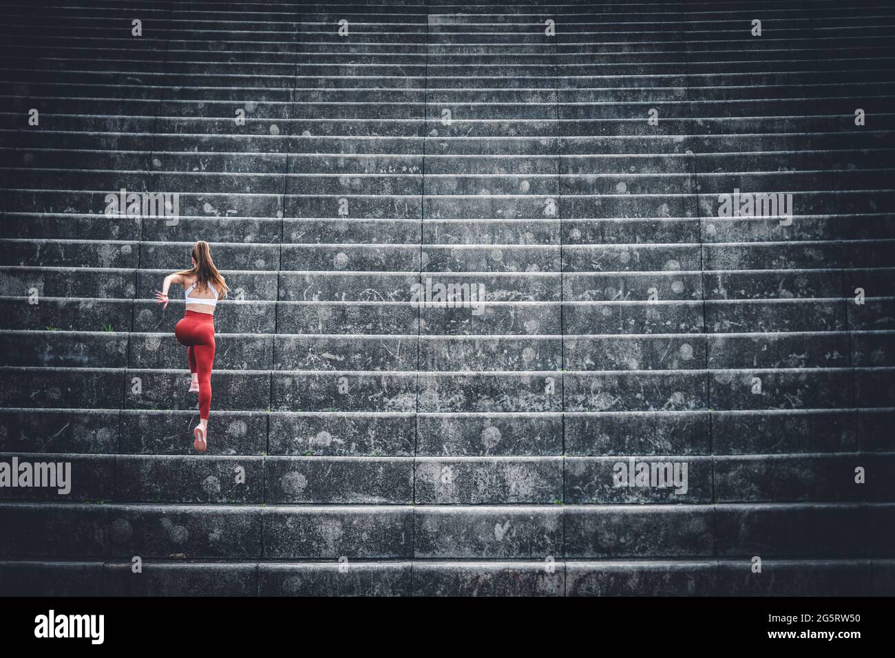 Athlete girl doing running up stairs, it is her lifestyle Stock Photo ...