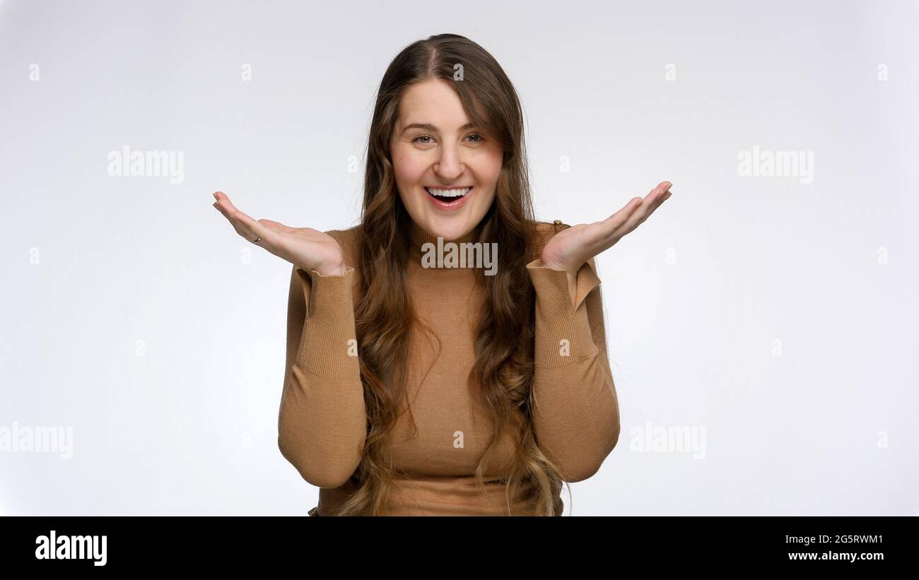 Portrait of happy lucky woman got surprised and saying Oh My God ...