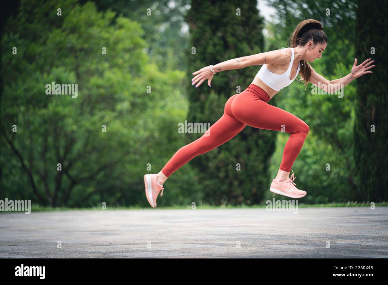 Athlete girl running, it is her lifestyle Stock Photo - Alamy