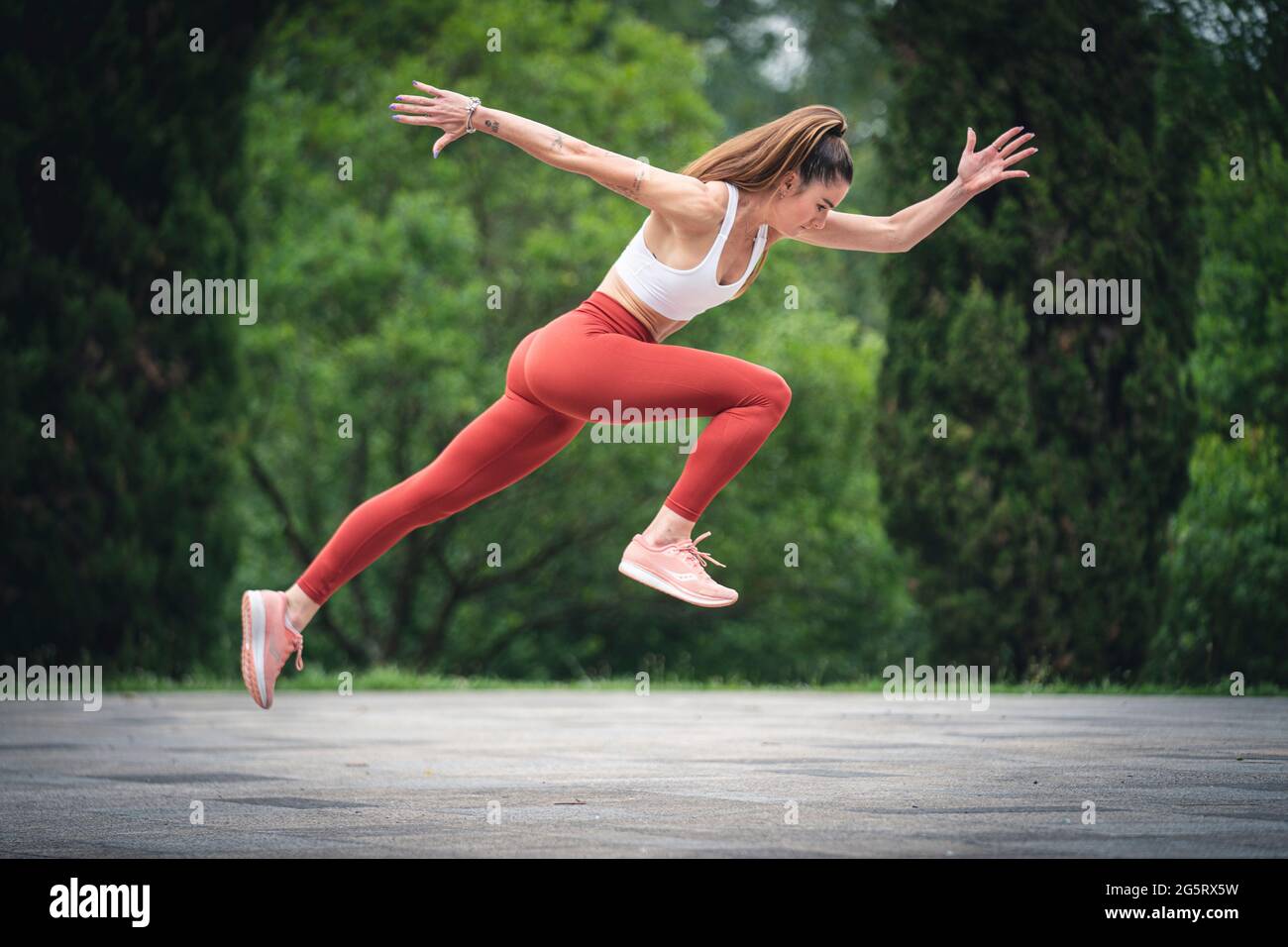 Athlete girl running, it is her lifestyle Stock Photo - Alamy