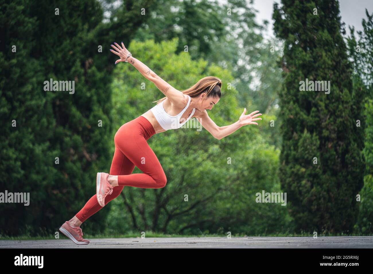 Athlete girl running, it is her lifestyle Stock Photo - Alamy