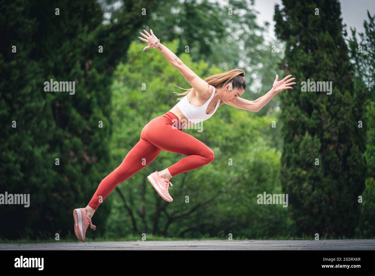 Athlete girl running, it is her lifestyle Stock Photo - Alamy