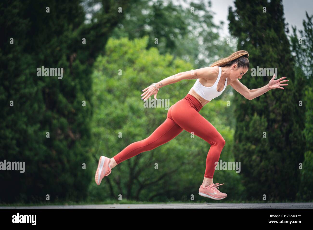 Athlete girl running, it is her lifestyle Stock Photo - Alamy
