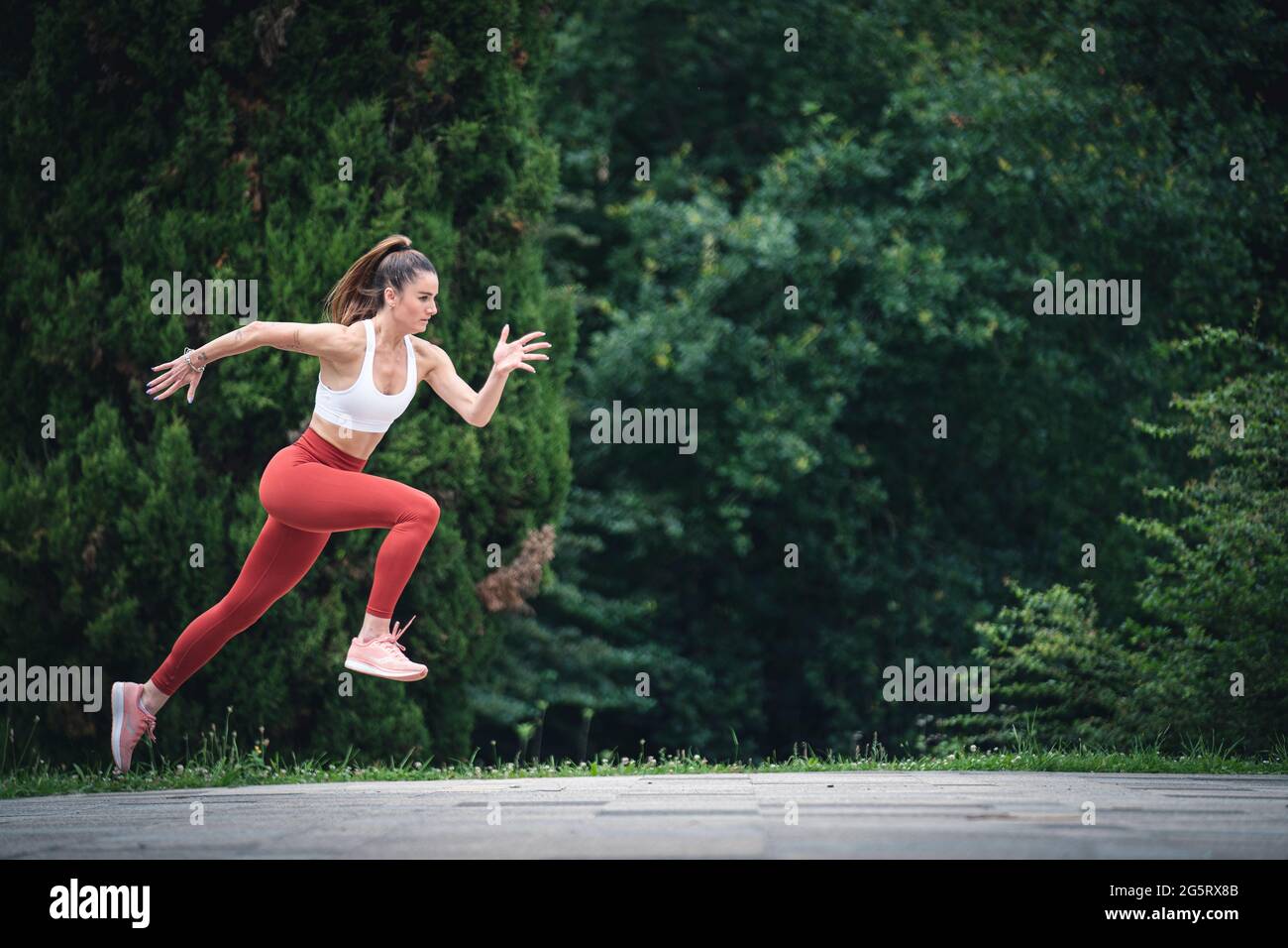 Athlete girl running, it is her lifestyle Stock Photo - Alamy