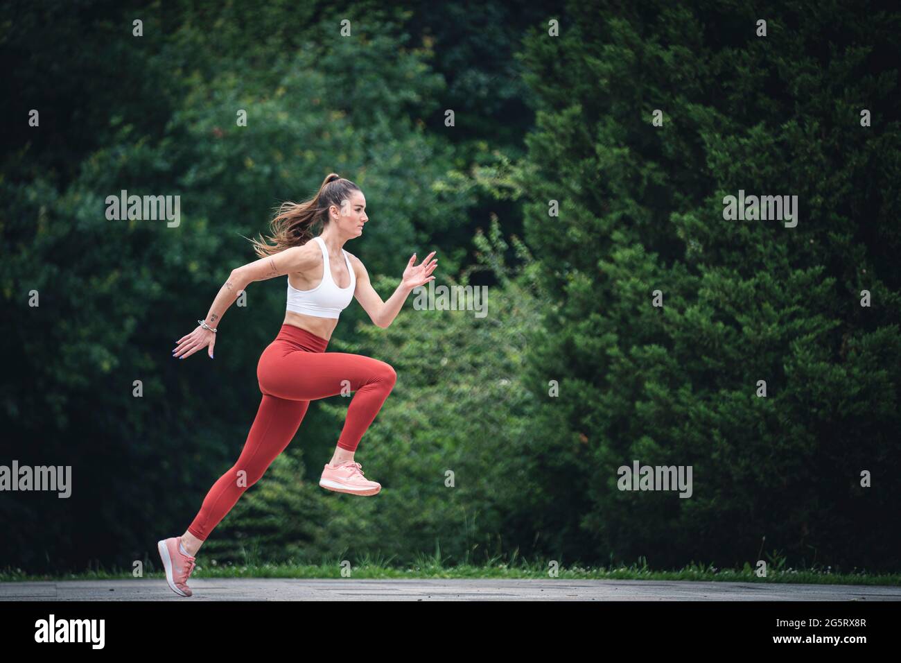 Athlete girl running, it is her lifestyle Stock Photo - Alamy