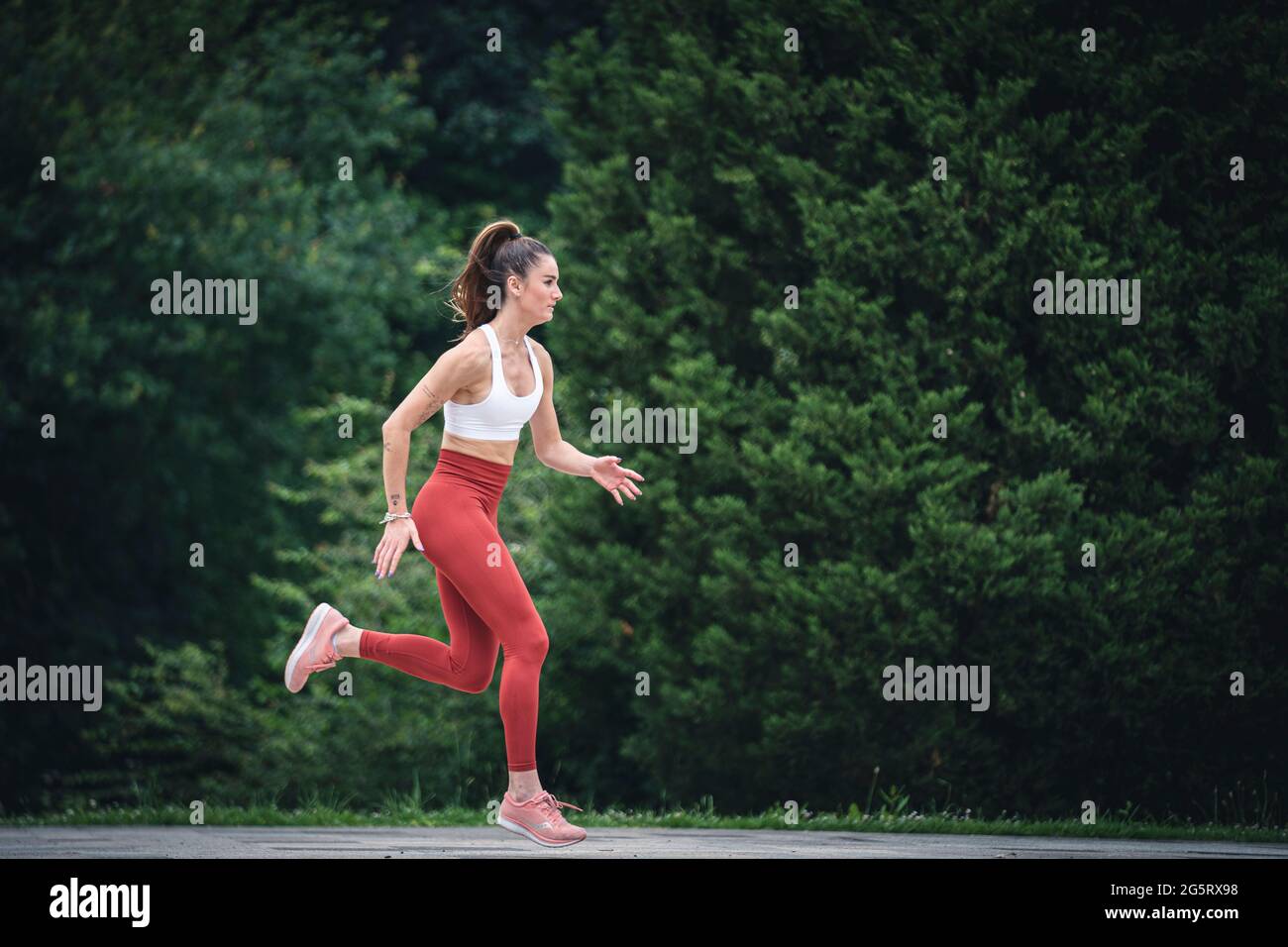 Athlete girl running, it is her lifestyle Stock Photo - Alamy