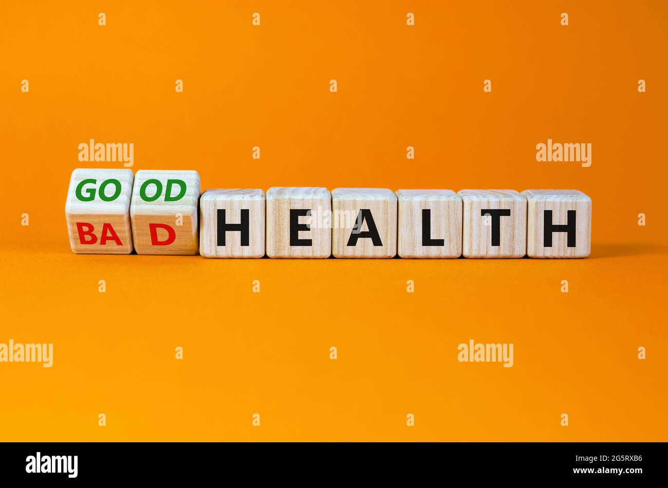 Good or bad health symbol. Turned wooden cubes and changed words bad ...