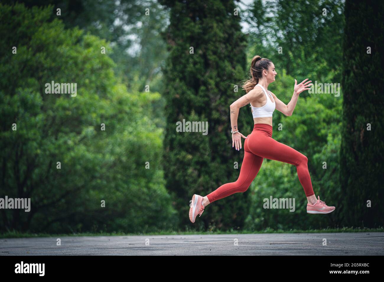 Athlete girl running, it is her lifestyle Stock Photo - Alamy
