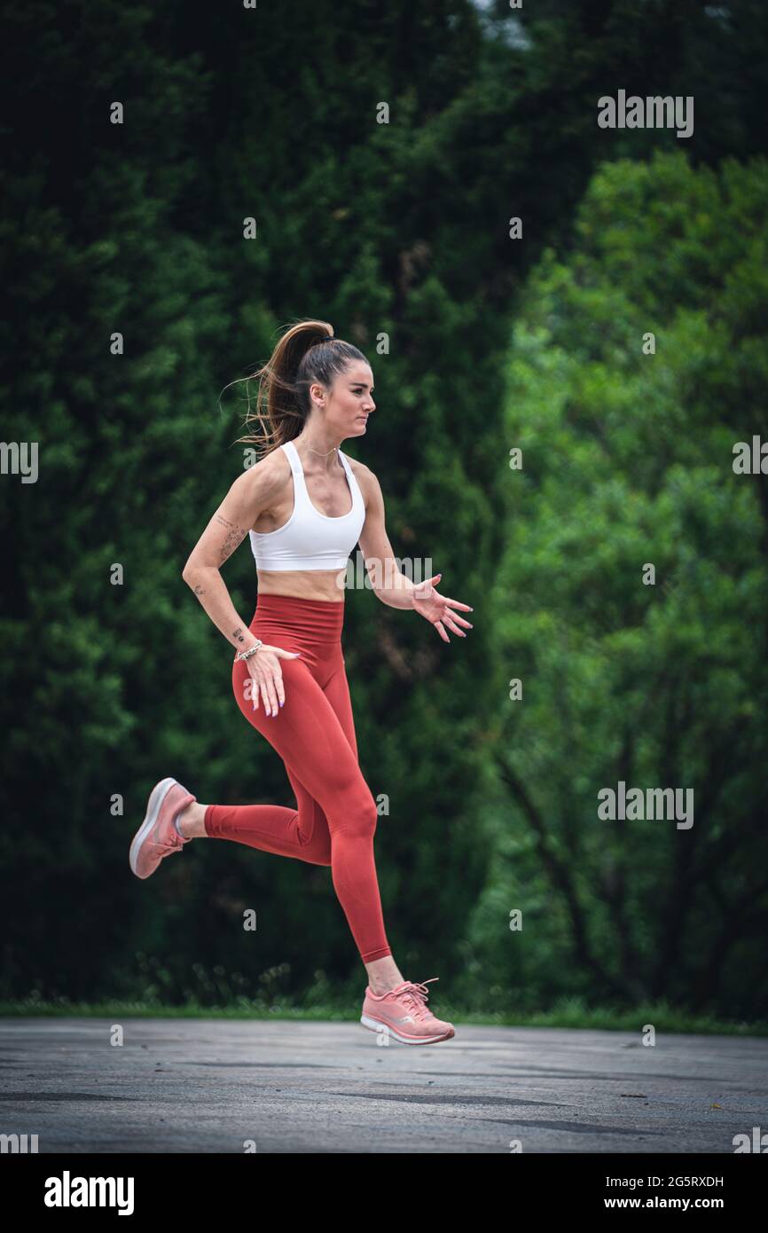 Athlete girl running, it is her lifestyle Stock Photo - Alamy