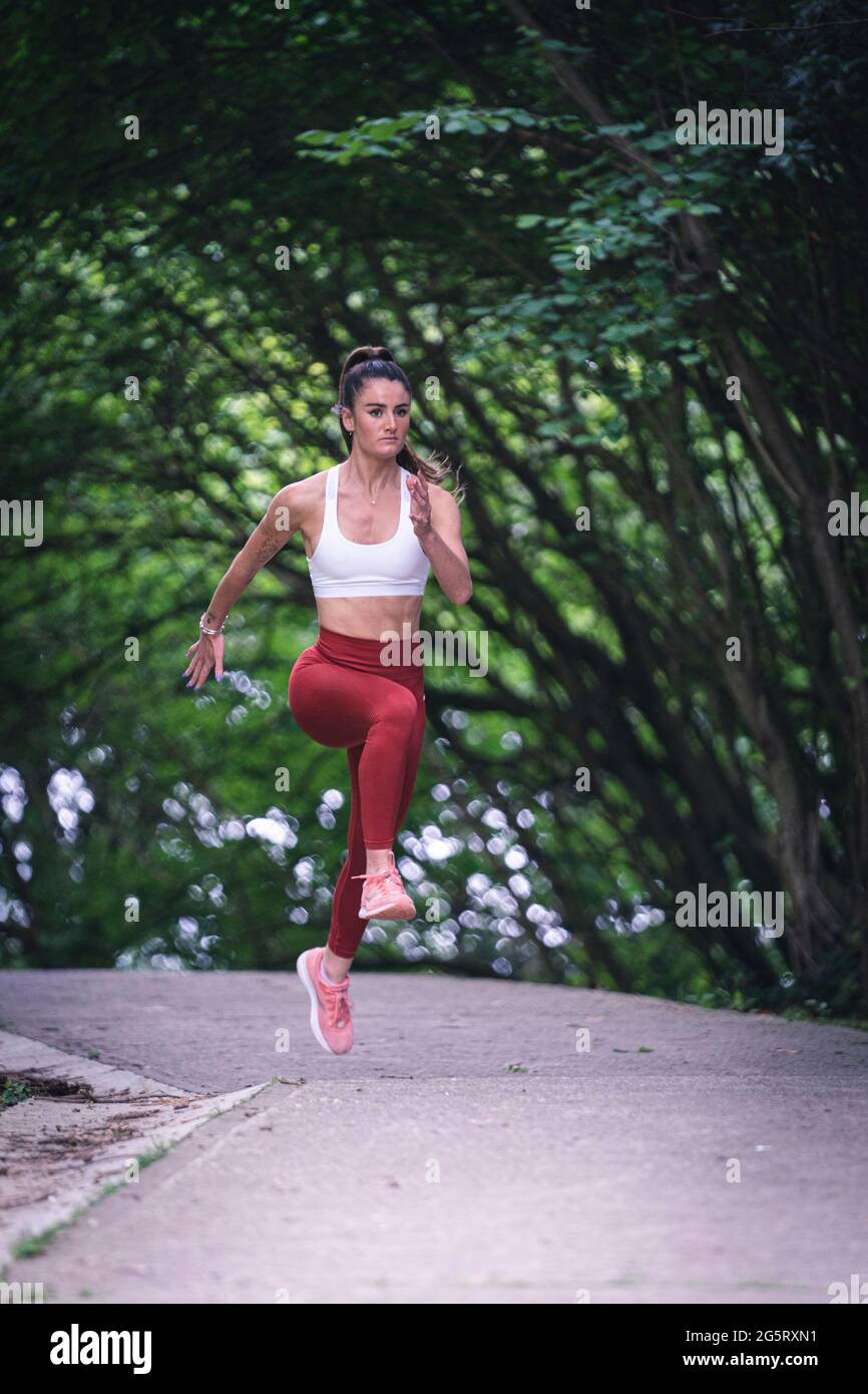 Athlete girl running, it is her lifestyle Stock Photo - Alamy