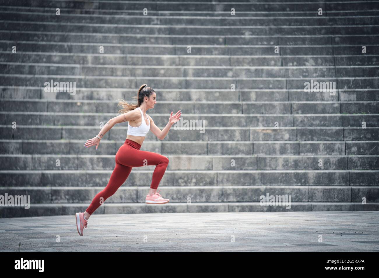 Athlete girl running, it is her lifestyle Stock Photo - Alamy