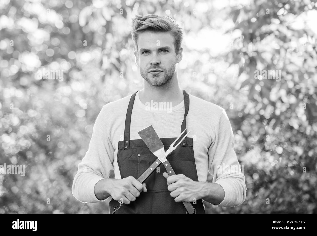 Man burger in summer Black and White Stock Photos & Images - Alamy