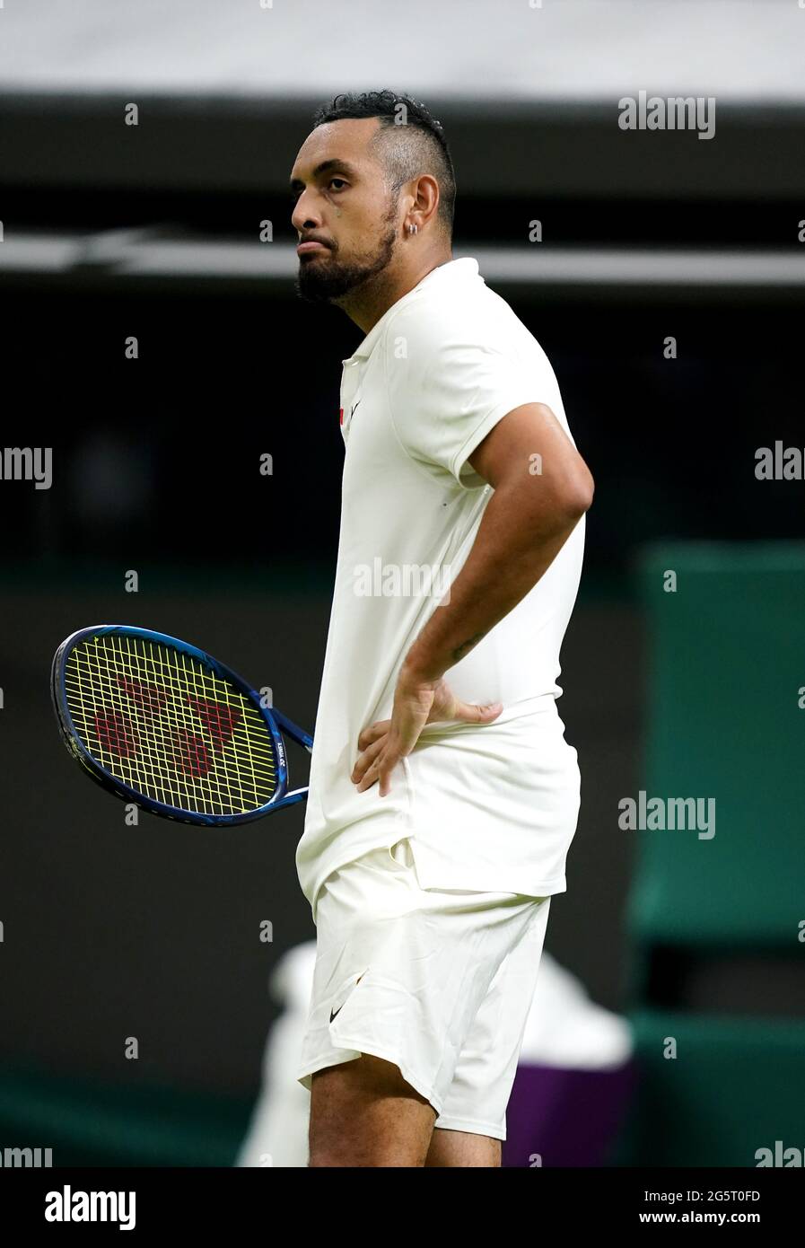 Nick Kyrgios reacts during his first round gentlemen's singles match ...