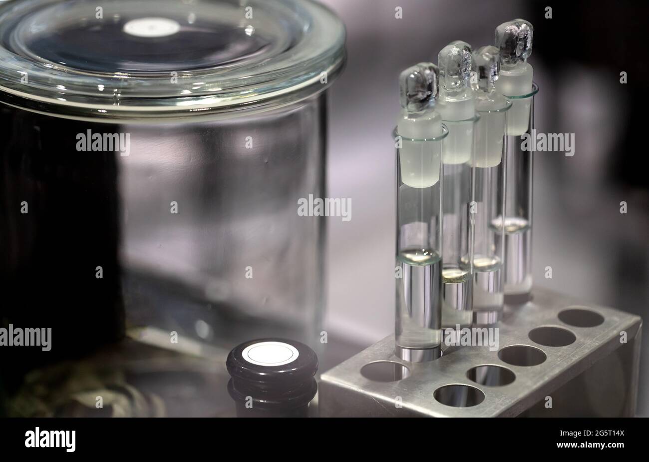 glass test tubes and jars in the lab. concept of medicine and science ...